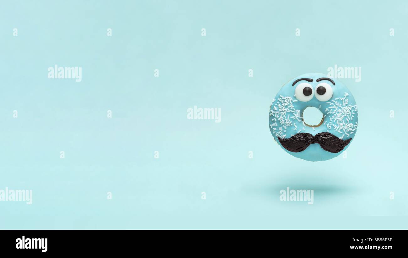 Blue glazed donut with mustache. Flying blue doughnut with funny face ...