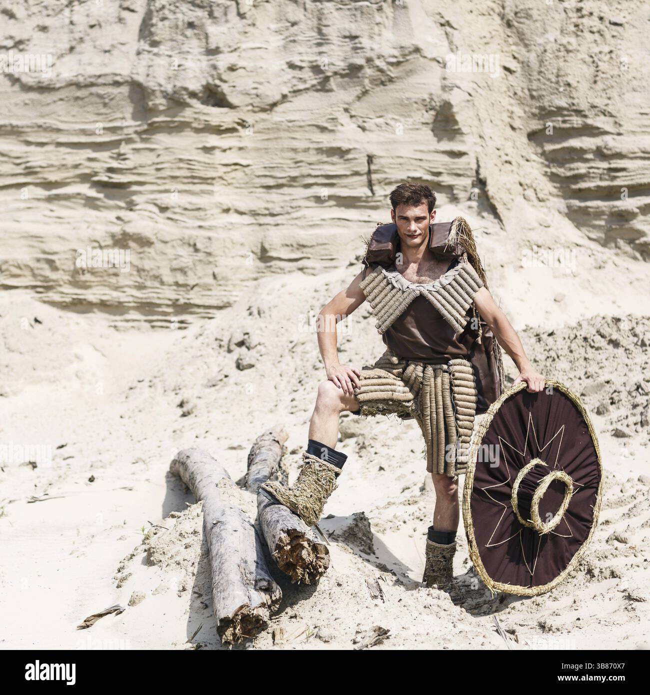 Fashion portrait of young man in desert Stock Photo - Alamy
