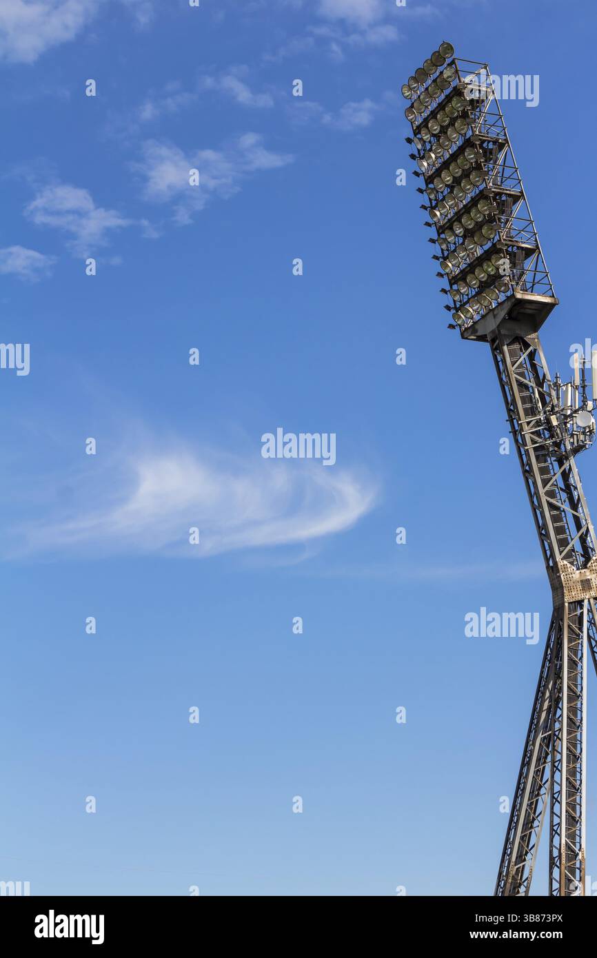 Floodlight mast of a sport stadium Stock Photo - Alamy
