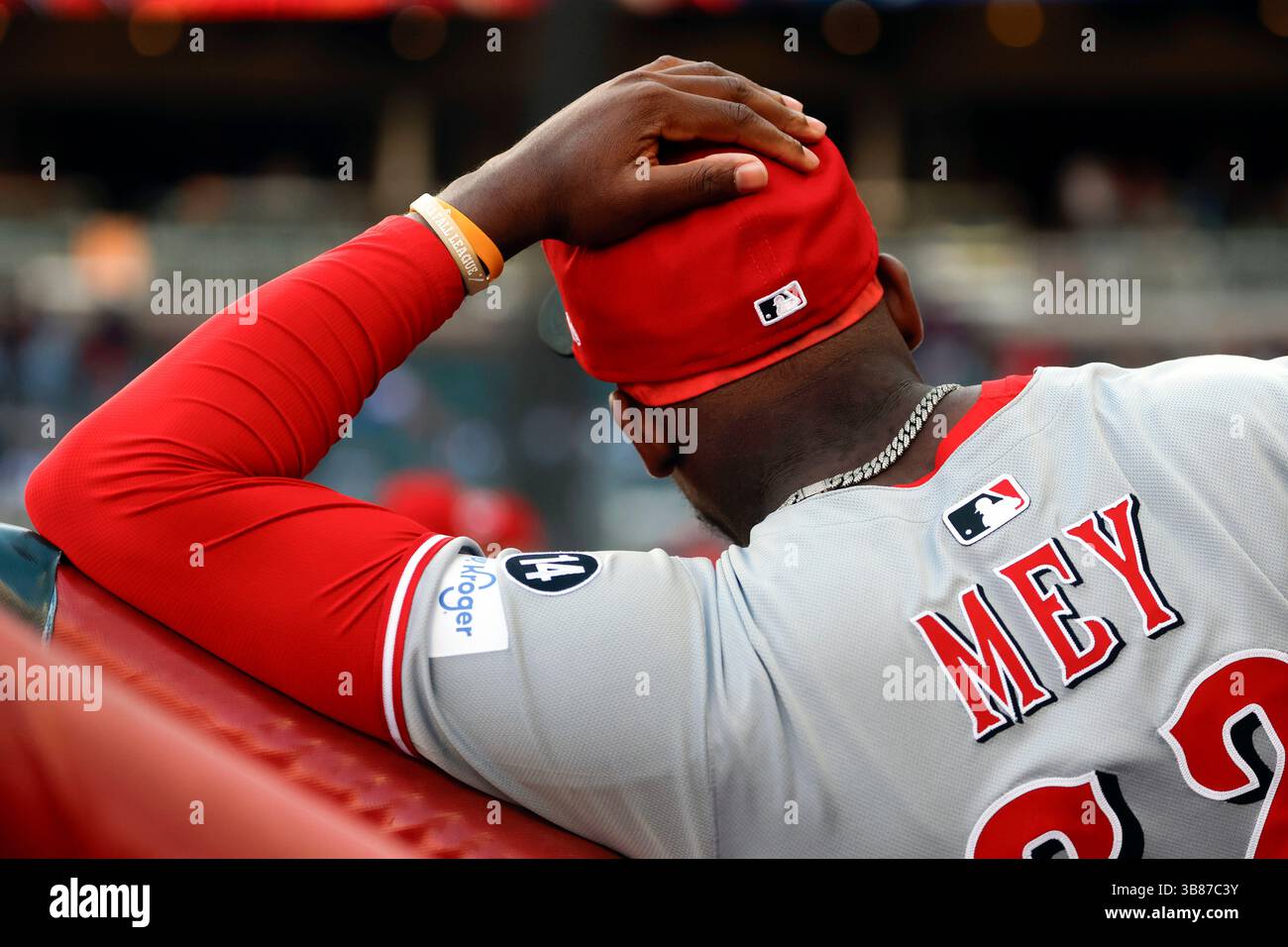 Cincinnati Reds pitcher Luis Mey watches from the dugout during the ...