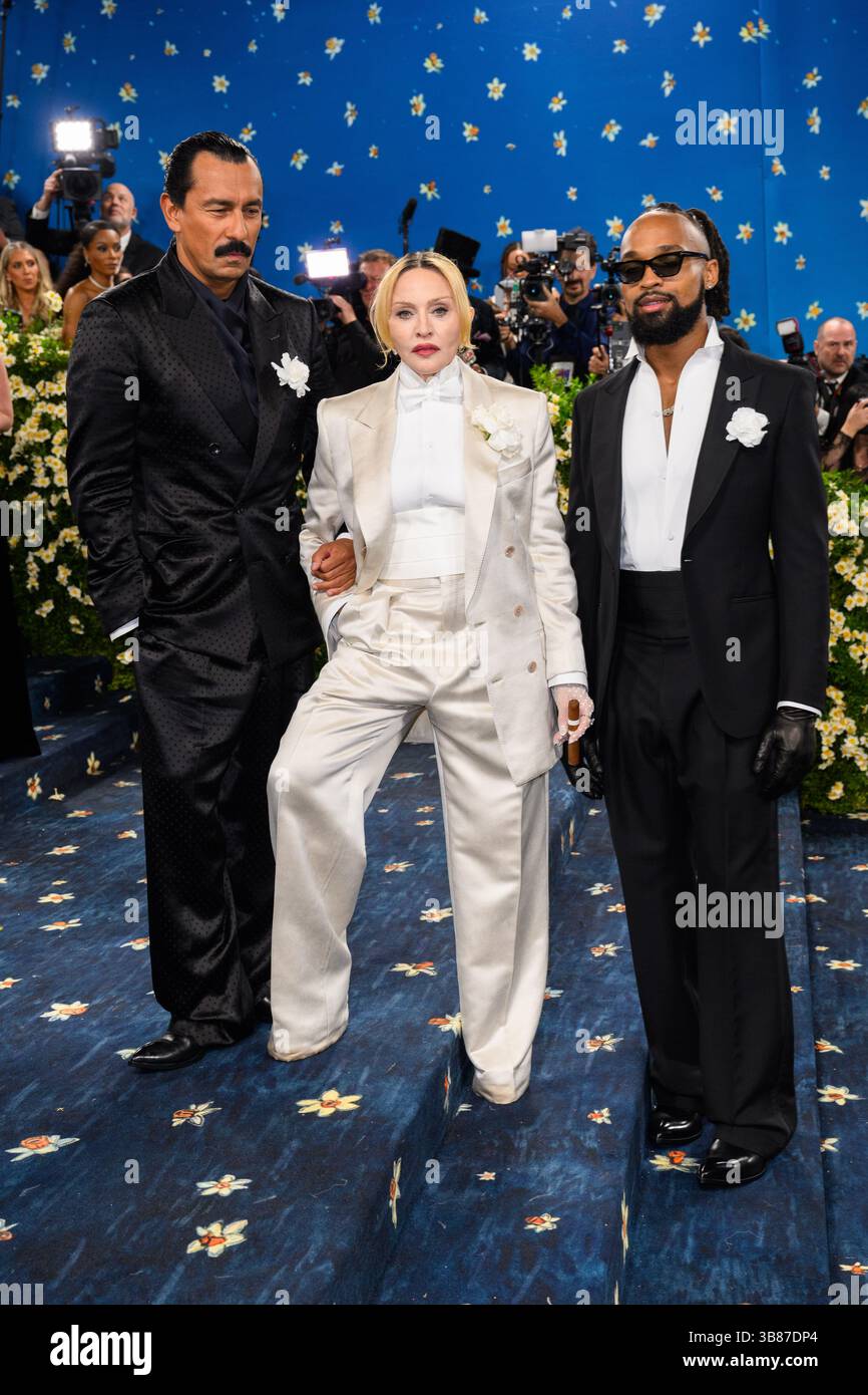 New York, USA. 5 May 2025. Haider Ackermann, Madonna and Akeem Morris attending the Metropolitan ...