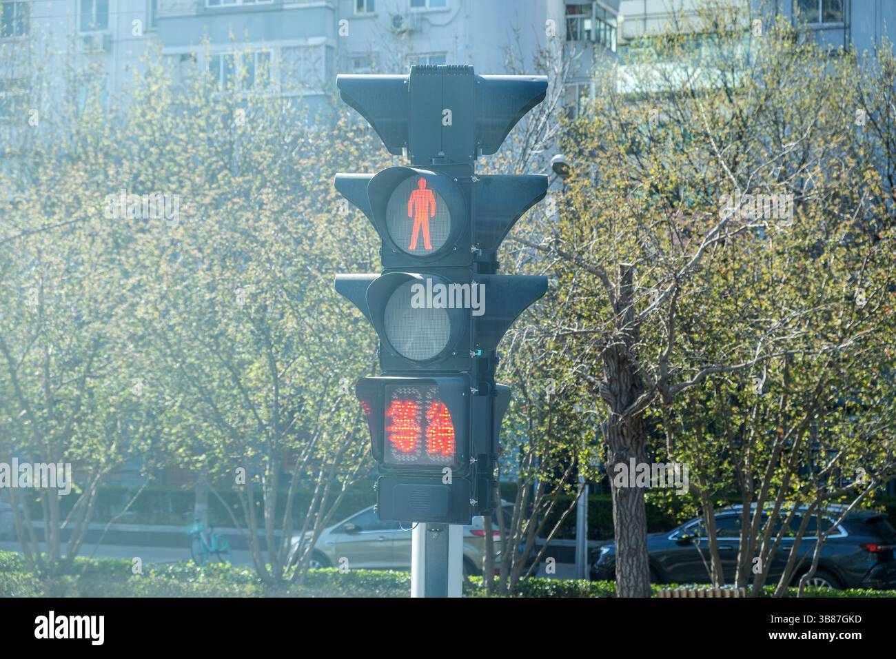 Pedestrian red light traffic signal in a street crossing in China ...
