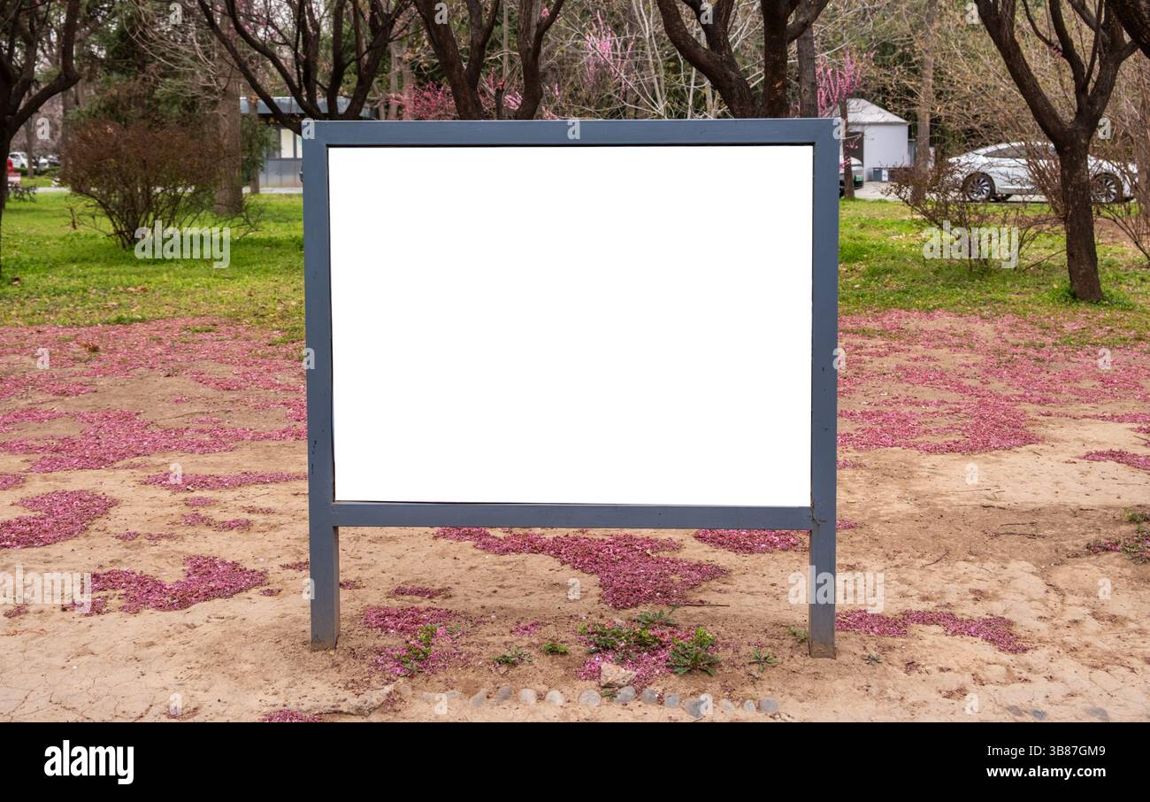 Signboard white blank display in a park, empty sign board template for ...
