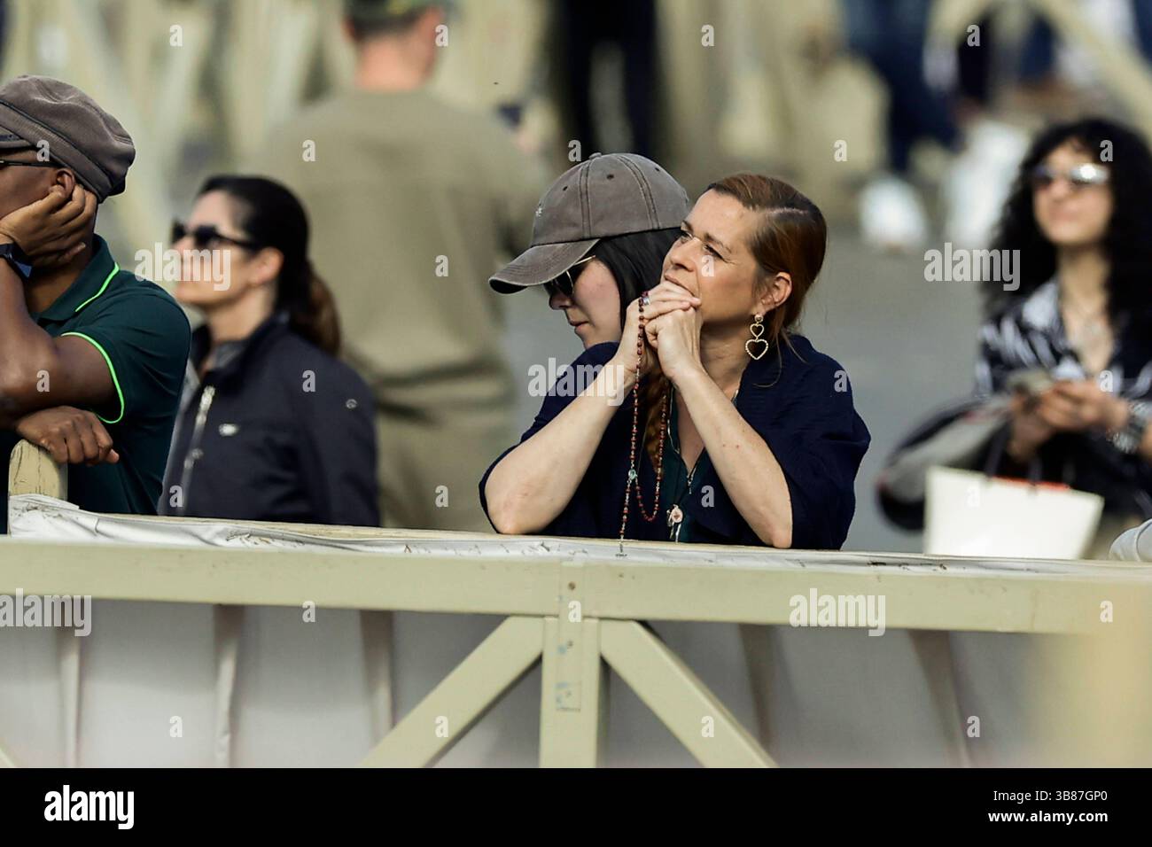 VATICAN POPE VOTE CONCLAVE people in st. peter s square watch the ...