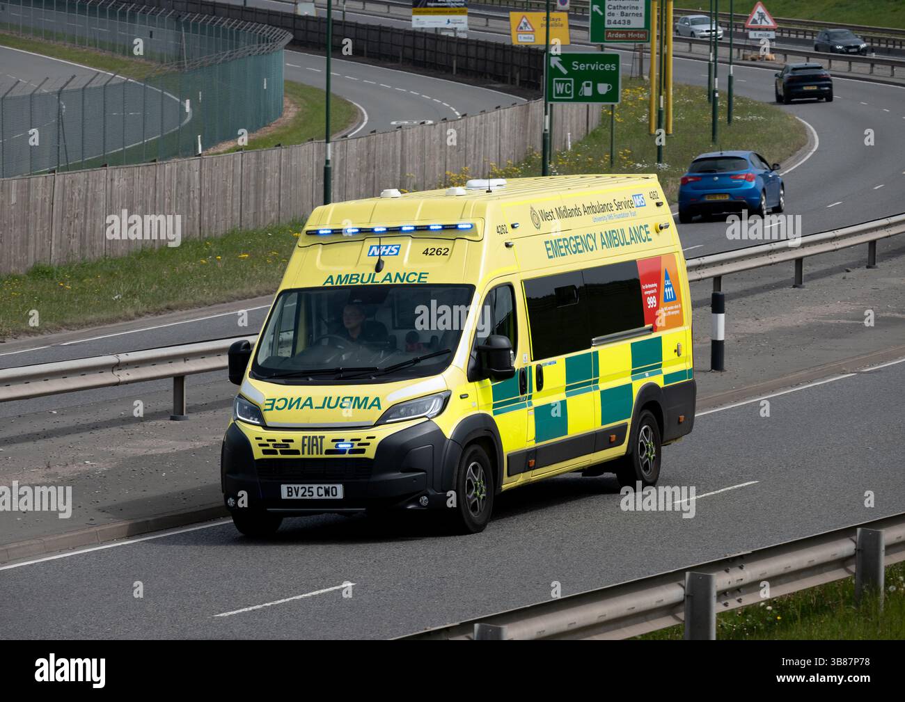 West Midlands Ambulance Service vehicle on the A45 road, Birmingham, UK ...