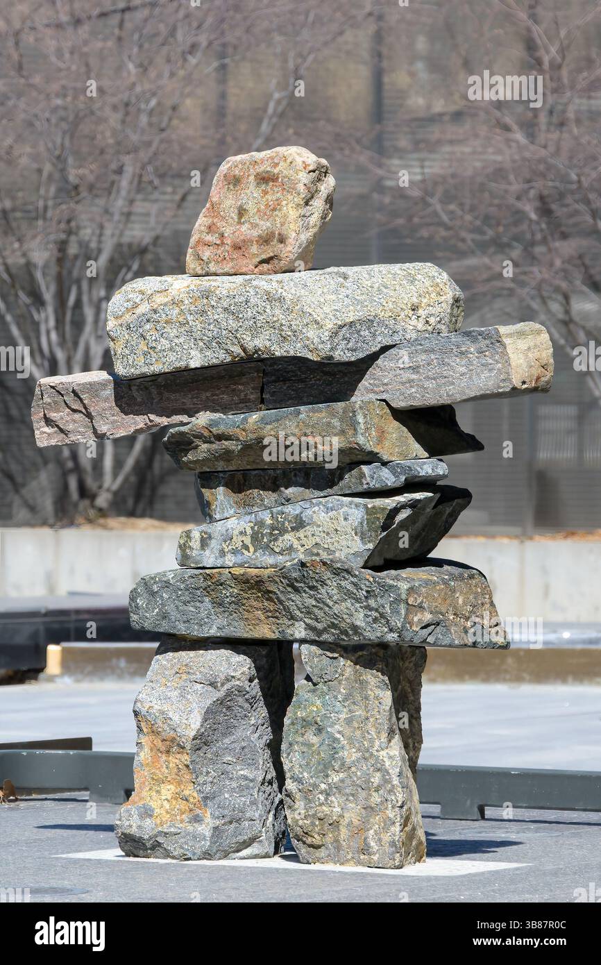 Stone Inukshuk sculpture in the Spirit Garden at Nathan Phillips Square ...