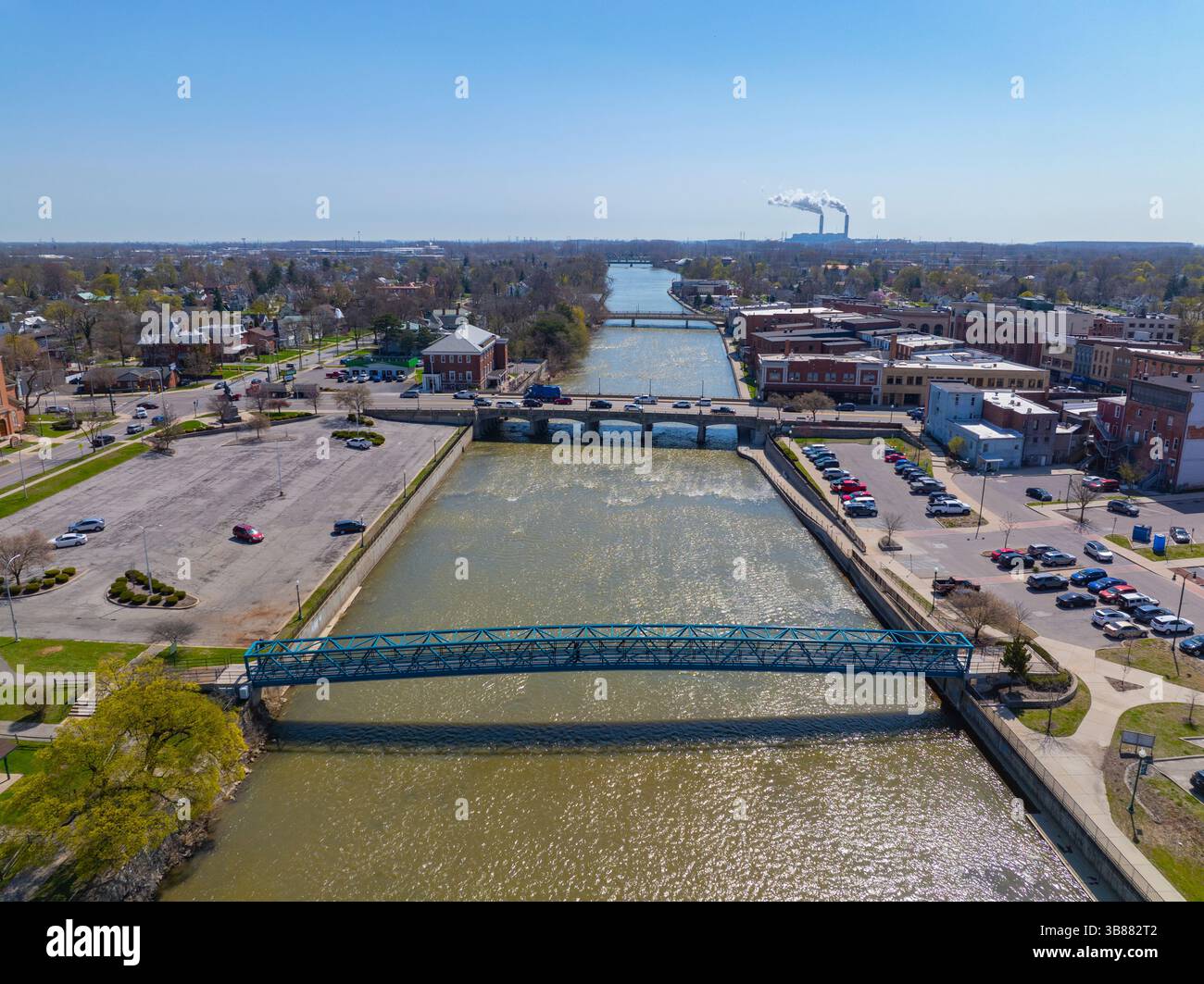 Martin Luther King Footbridge aerial view over River Raisin in historic ...