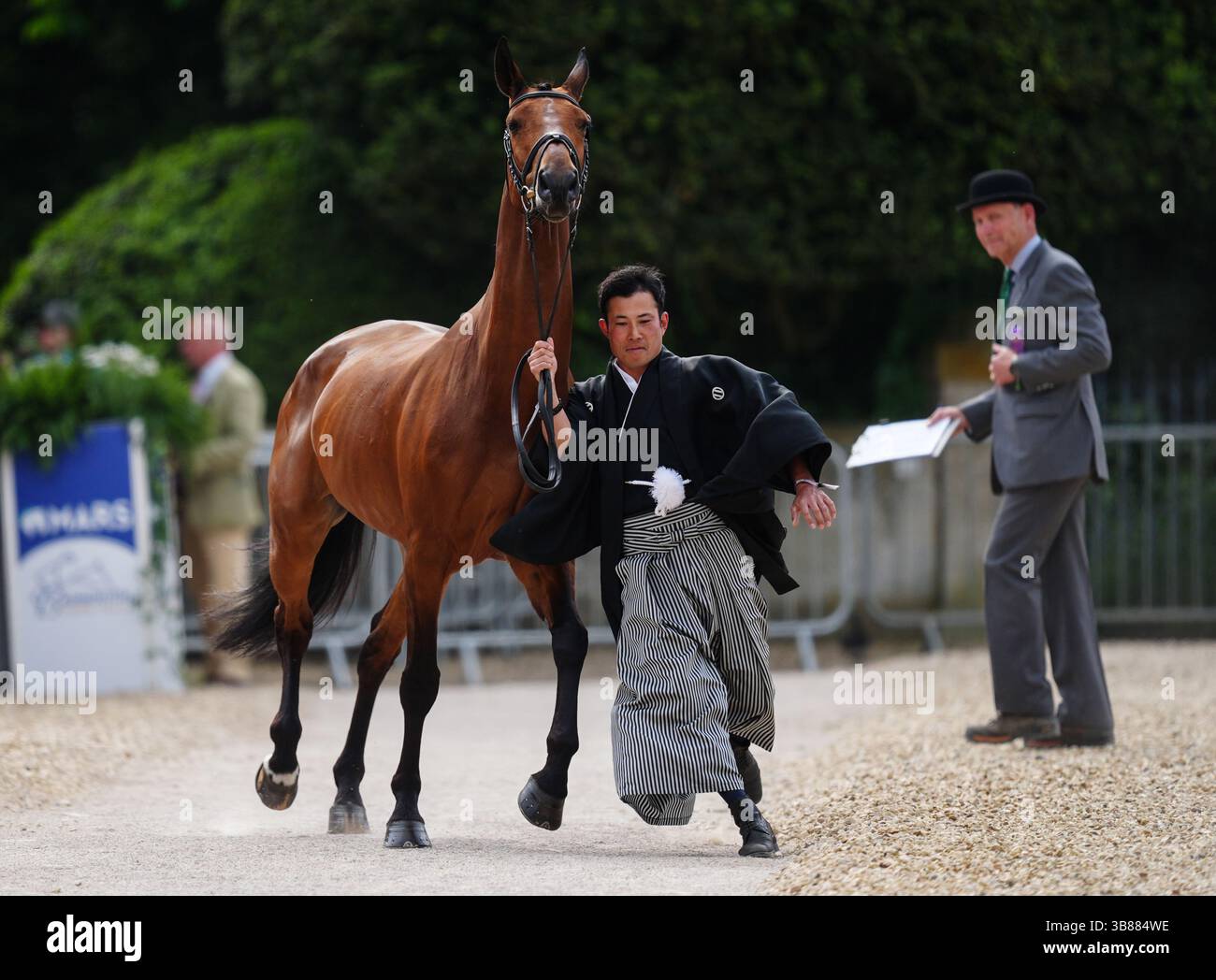 Ryuzo Kitajima with Feroza Nieuwmoed during the horse inspection on day ...