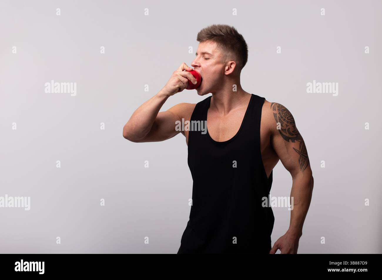 Cool Handsome Sporty Strong Man With Muscular Body With Black Tank Top ...