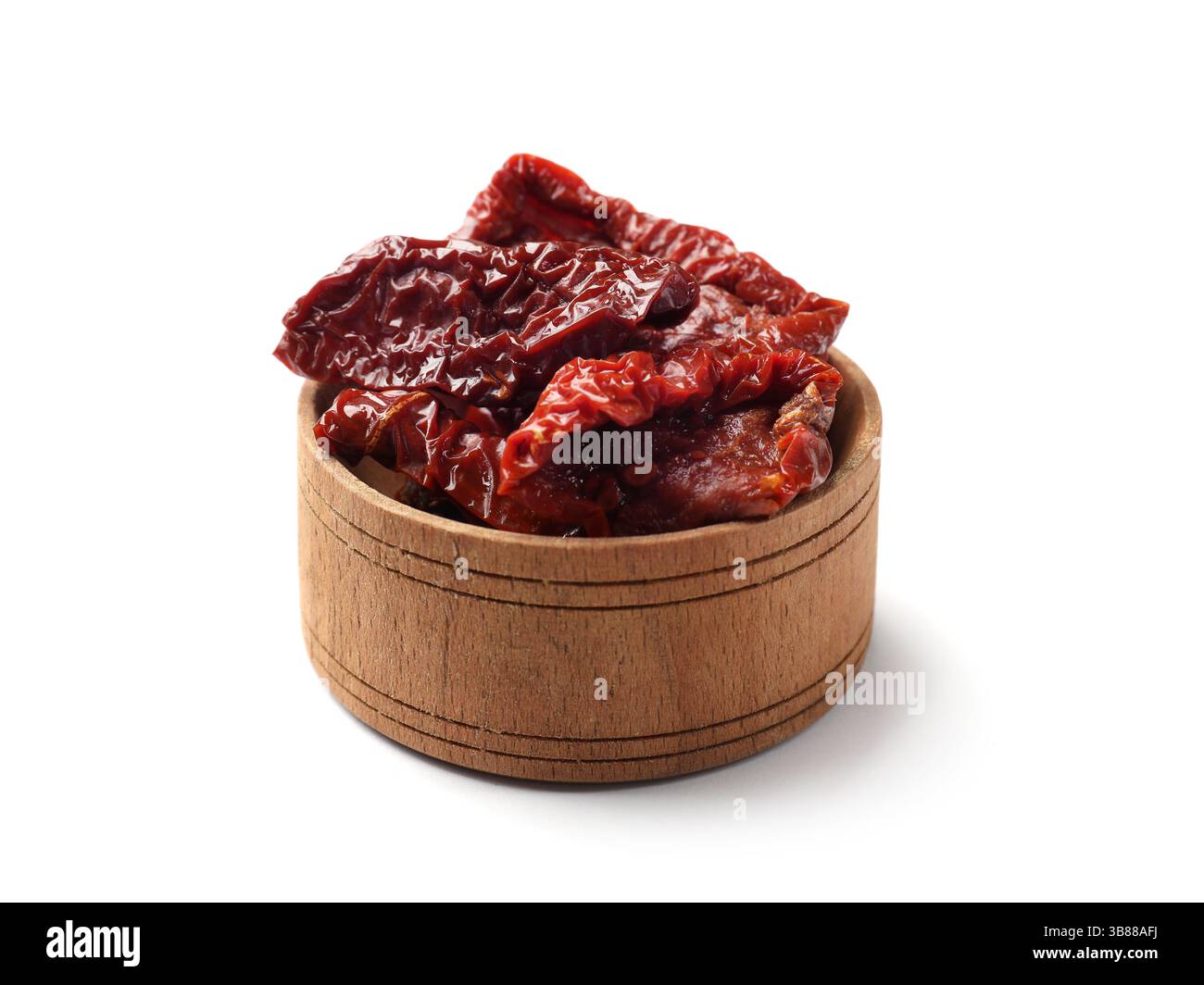 Delicious sun dried tomatoes in bowl isolated on white Stock Photo - Alamy