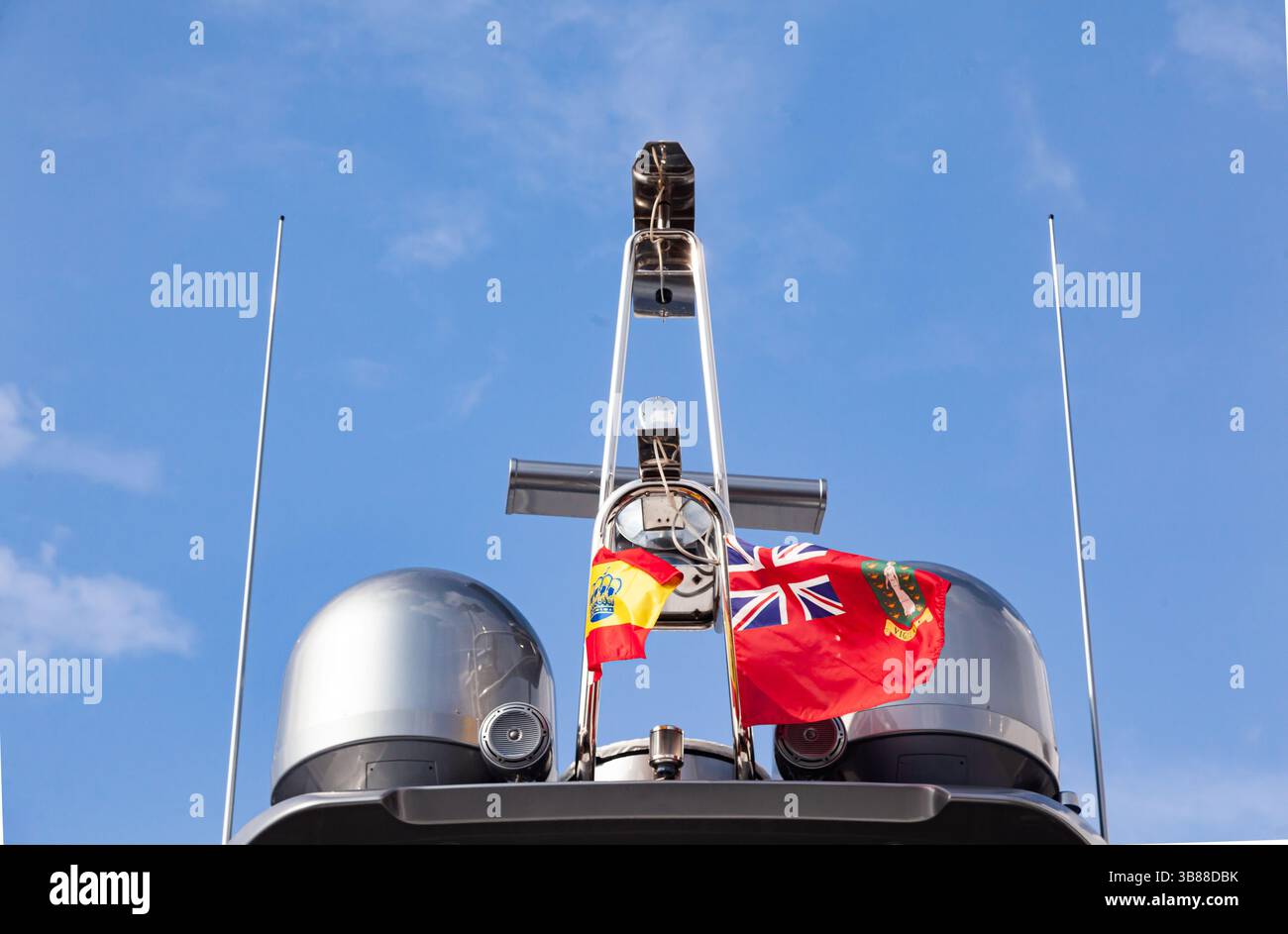 Large mast of a yacht with navigational equipment, view from below ...
