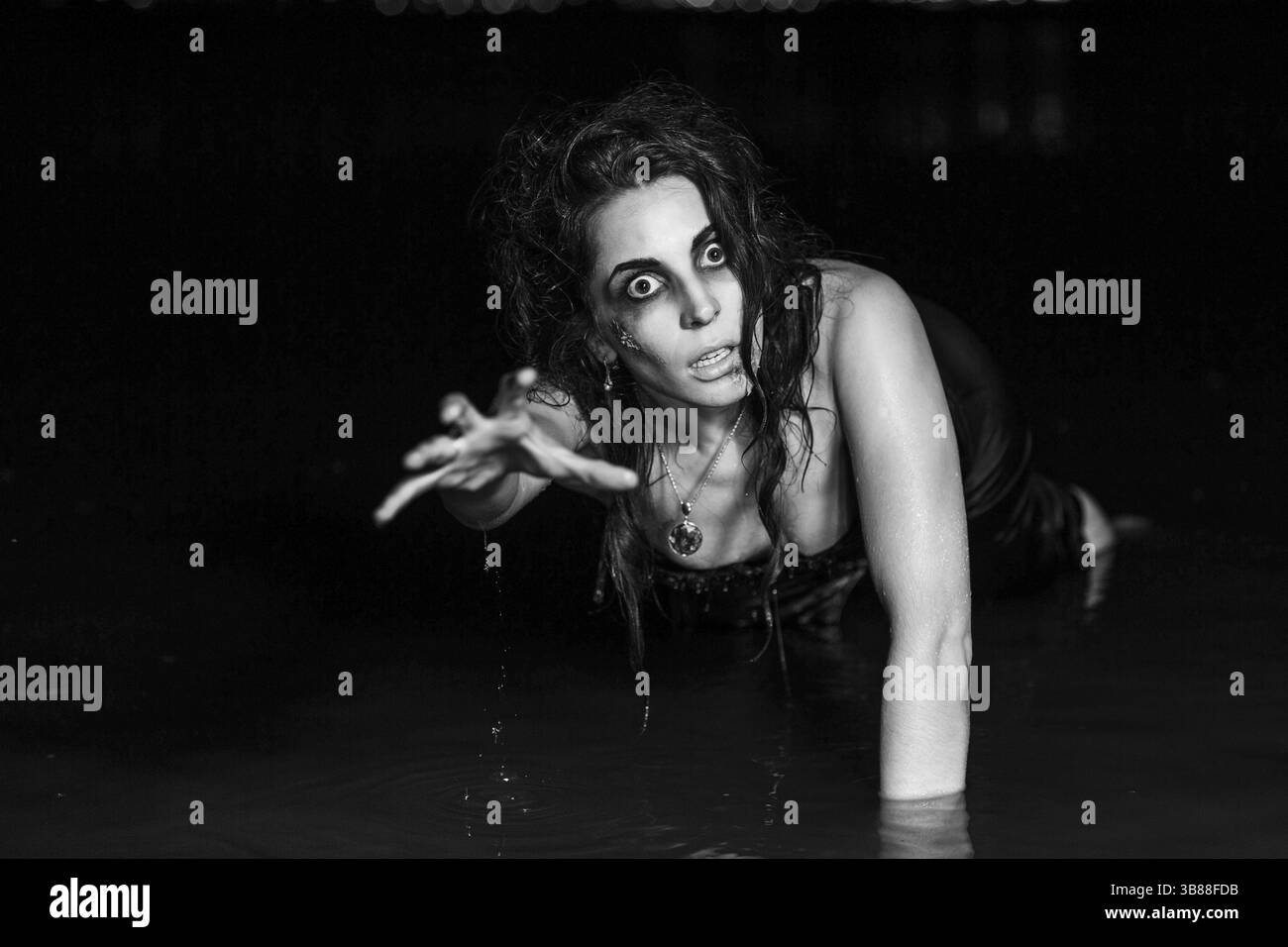 Horror Scene - the woman in the swamp Stock Photo - Alamy