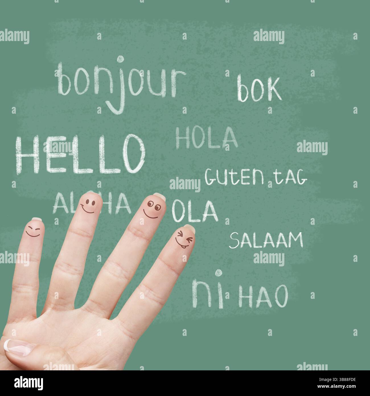 Hello in various languages on a green chalkboard Stock Photo - Alamy