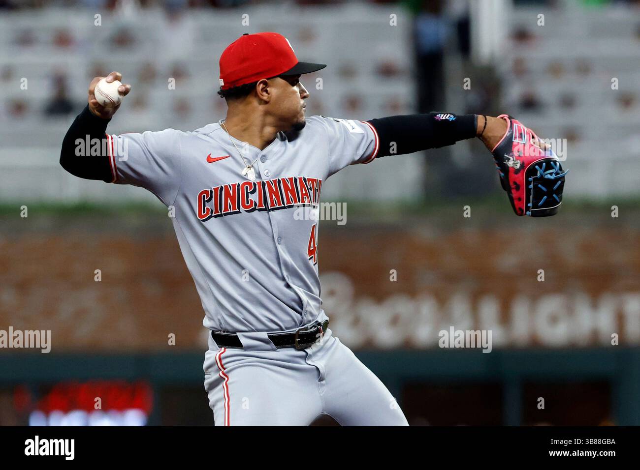 Cincinnati Reds third baseman Santiago Espinal throws to first for the ...
