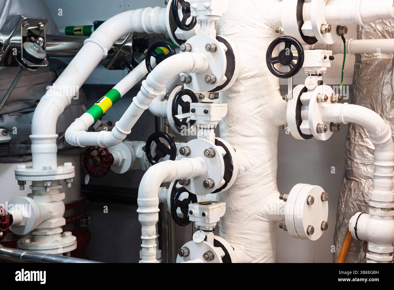 Valve system with pipes in the engine room on the vessel Stock Photo ...