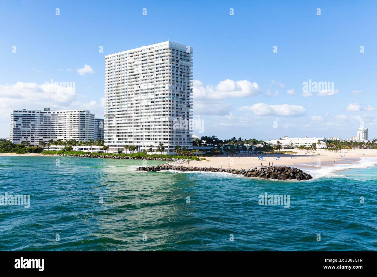 View of residential high-rise buildings with a gorgeous beach on the ...