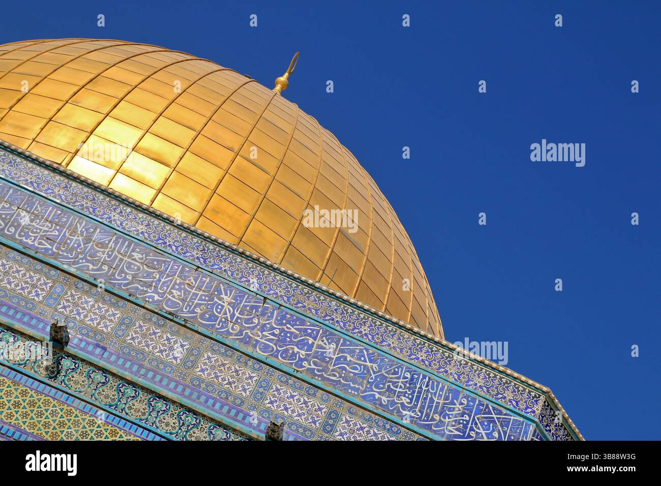 Close-up of the Dome of the Rock golden dome and intricate blue Arabic ...
