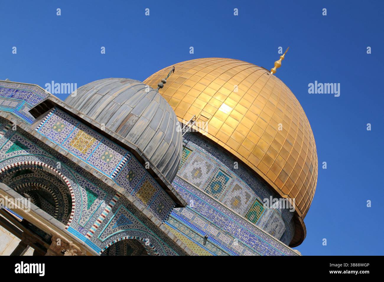 View of the Dome of the Rock with golden dome, smaller lead dome, and ...