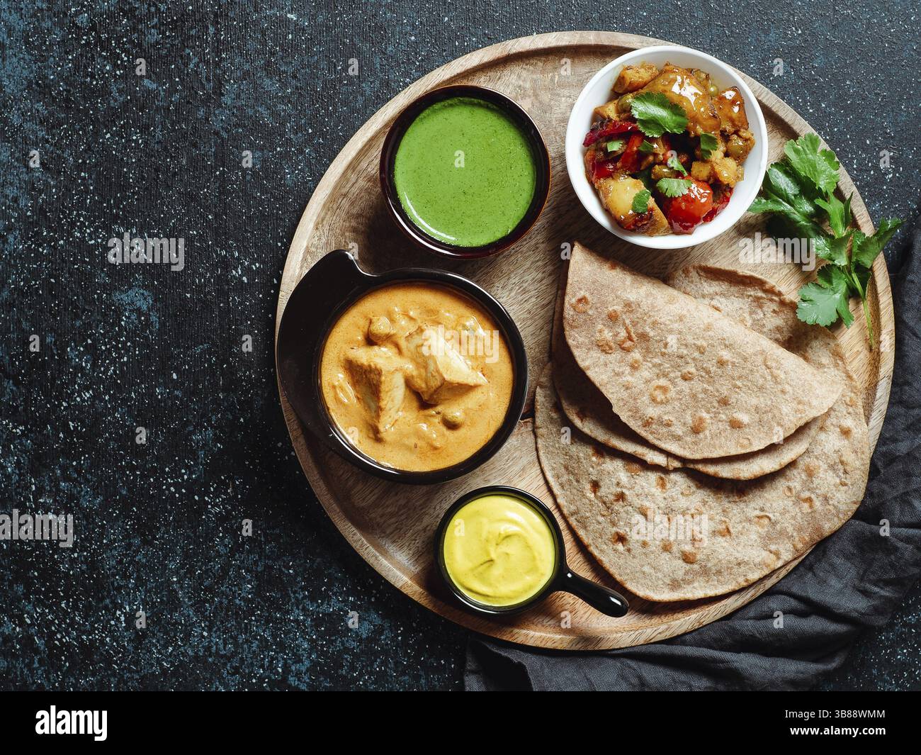 Indian cuisine dishes: vegetable curry, shahi paneer, chapati, chutney ...