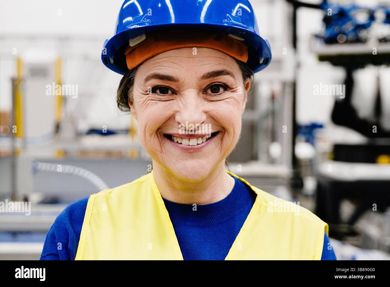 Mature Engineer woman working inside robotic factory, Business industry, technology concept ...