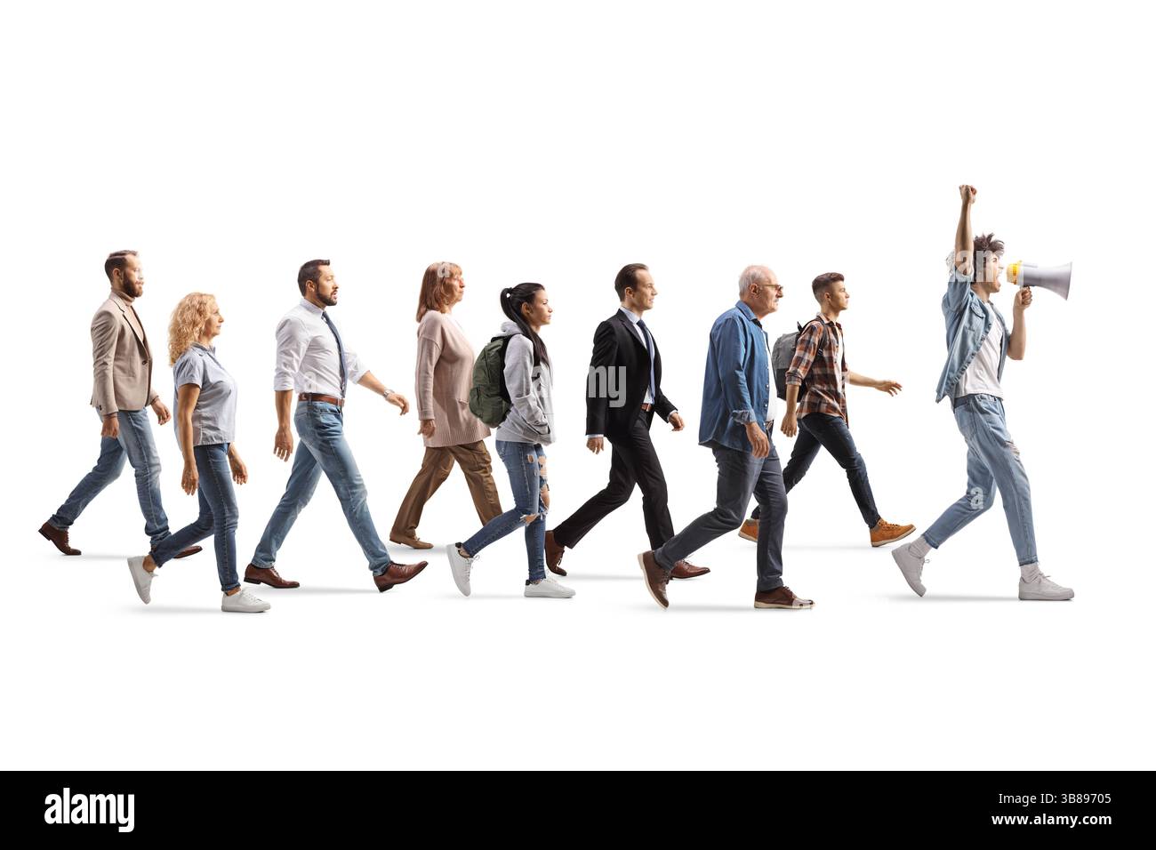 Group of people following a young man with a megaphone on a protest ...