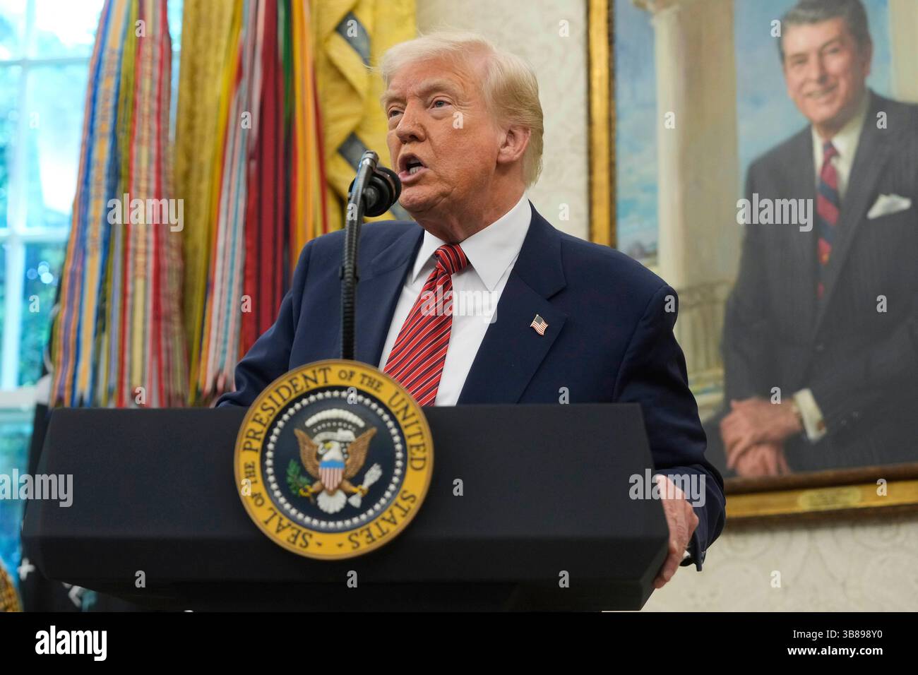 President Donald Trump speaks after David Perdue was sworn in as U.S ...