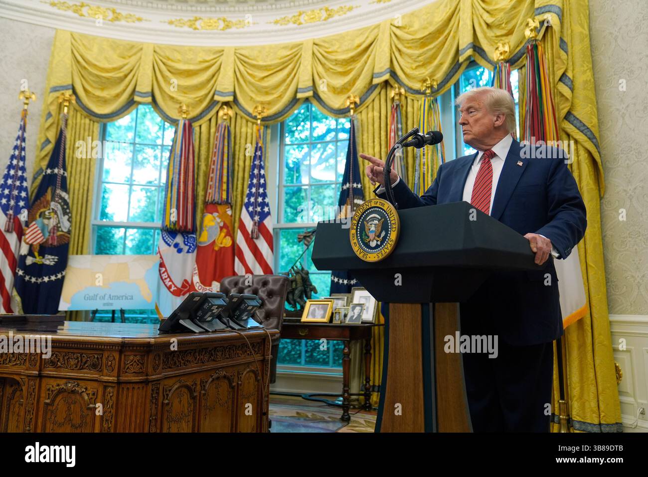 President Donald Trump speaks to reporters after David Perdue was sworn ...