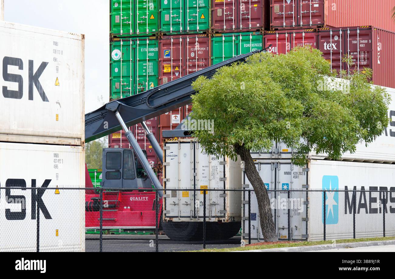 Miami, Florida, USA. 5th May, 2025. Cargo containers stacked near the ...