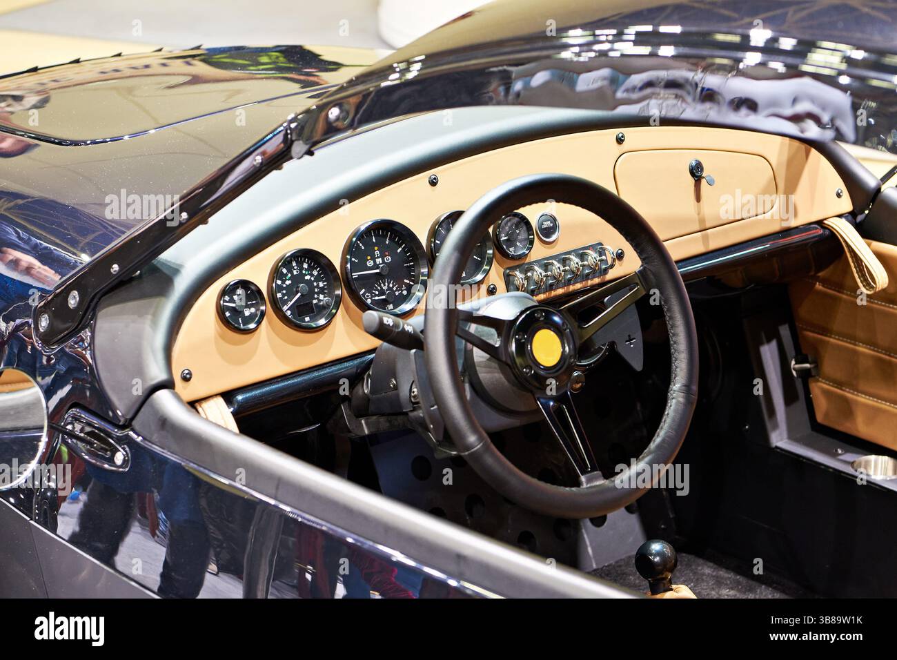 Steering wheel and custom car dashboard Stock Photo - Alamy