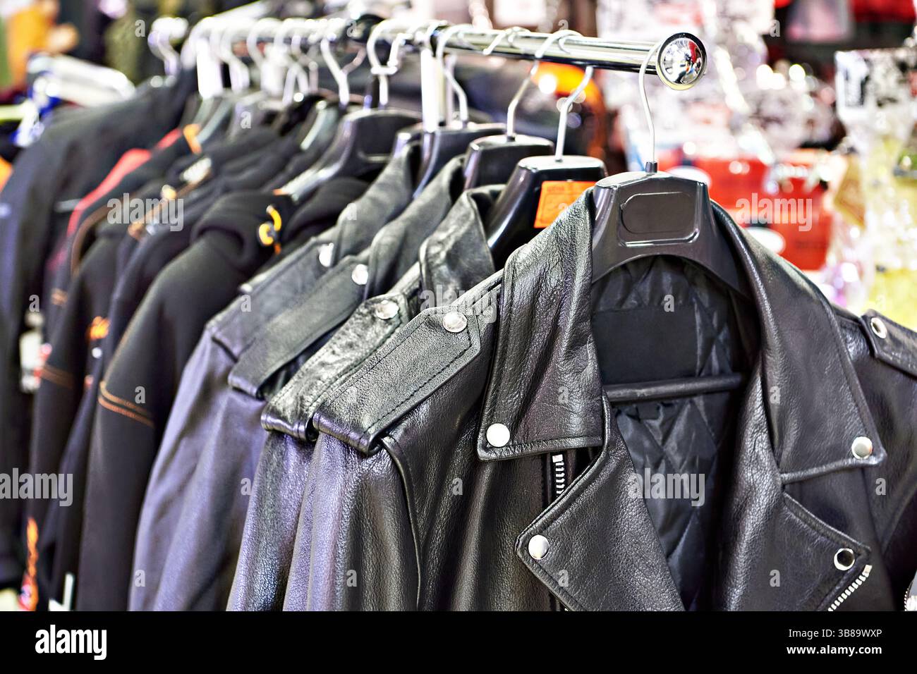 Motorcycle leather jackets in store Stock Photo - Alamy