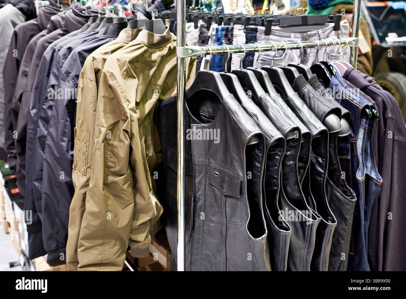 Coat hanger leather jacket hi-res stock photography and images - Alamy