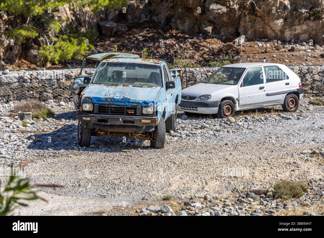 Crete, Greece - October 18, 2024: Vehicles parked near the end of ...