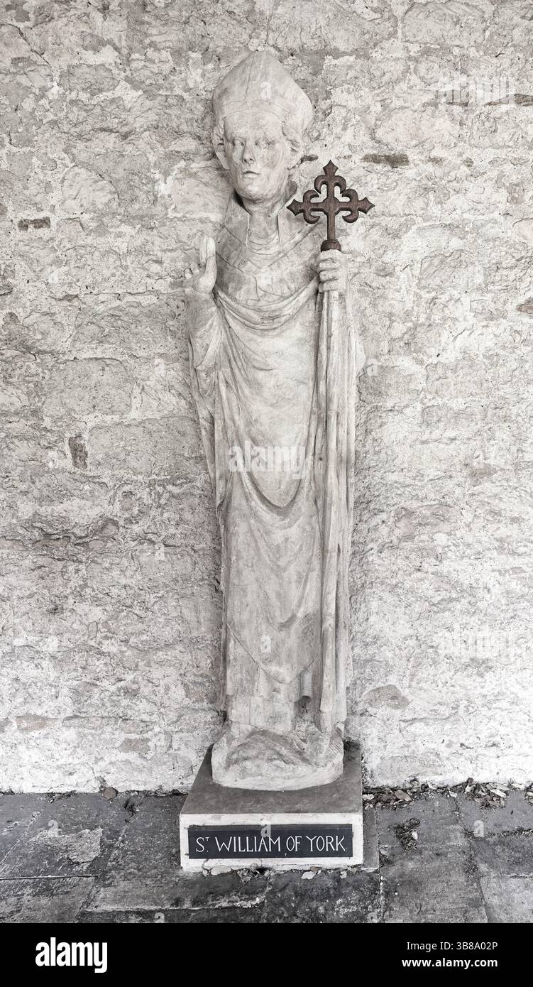 Medieval stone statue, of St William of York, in the cloister at New ...