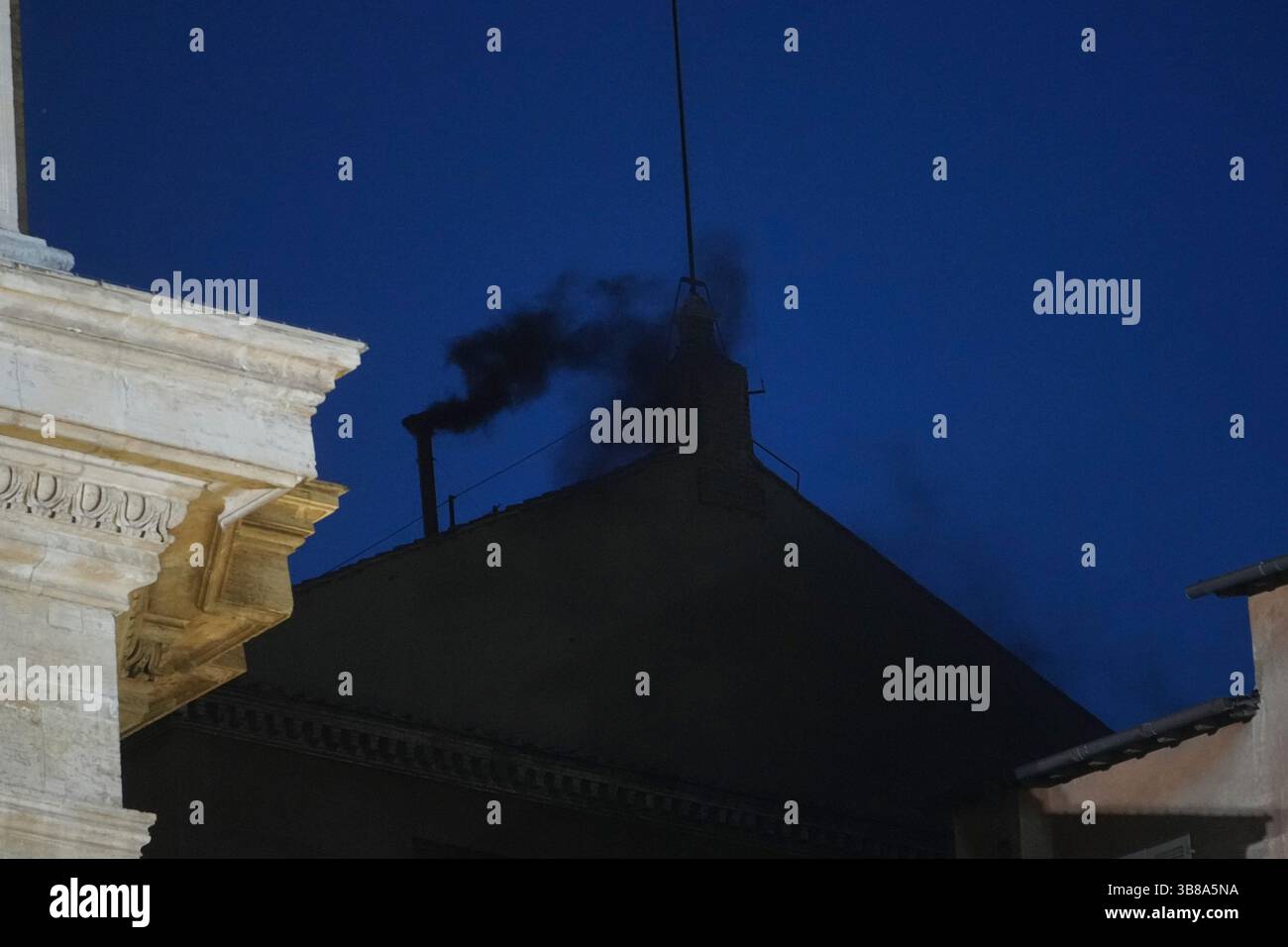 Black smoke billows from the chimney of the Sistine Chapel during the ...