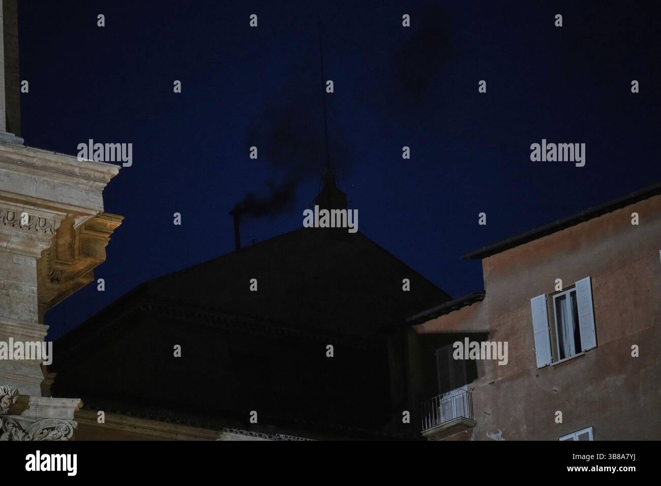 Black smoke billows from the chimney of the Sistine Chapel during the ...