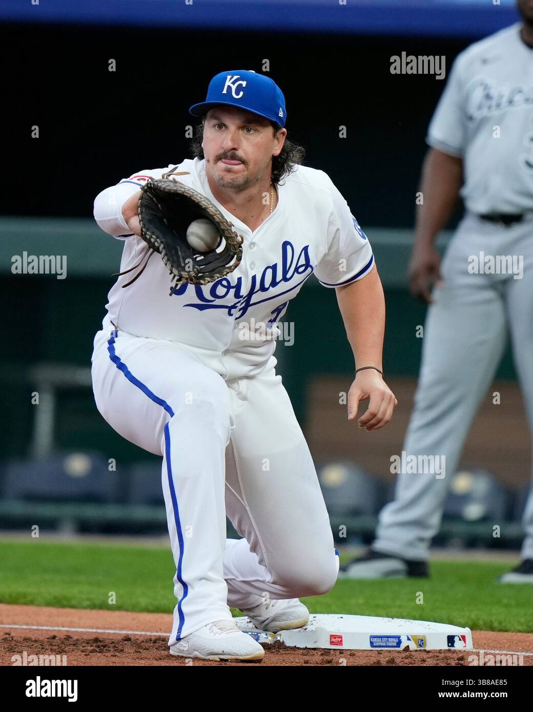 Kansas City Royals first baseman Vinnie Pasquantino catches the ball ...