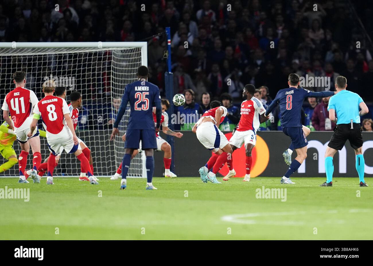 Paris Saint-Germain's Ruiz Fabian (second right) scores their side's ...