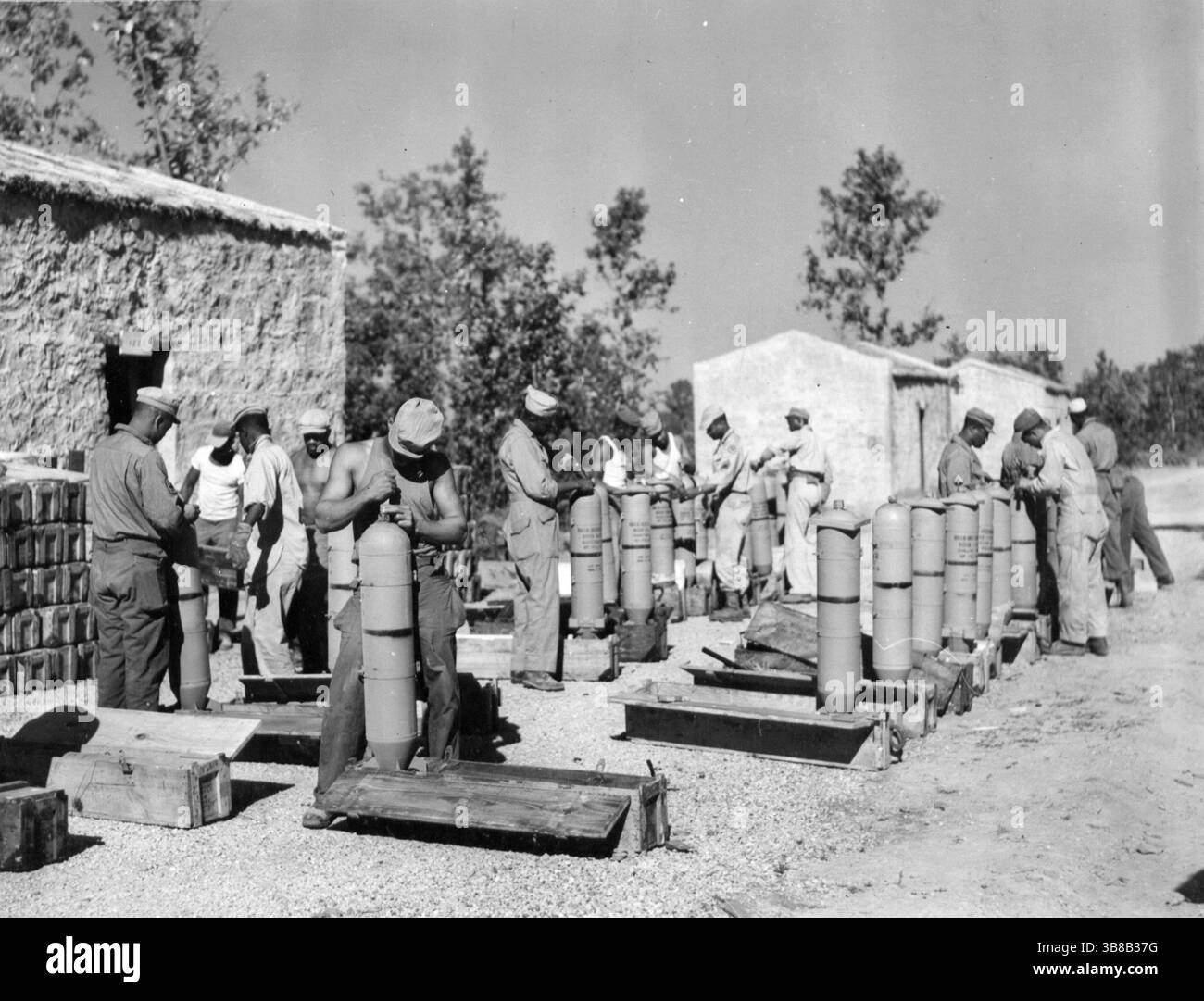M47 chemical incendiary bombs being unpacked from their crates and ...