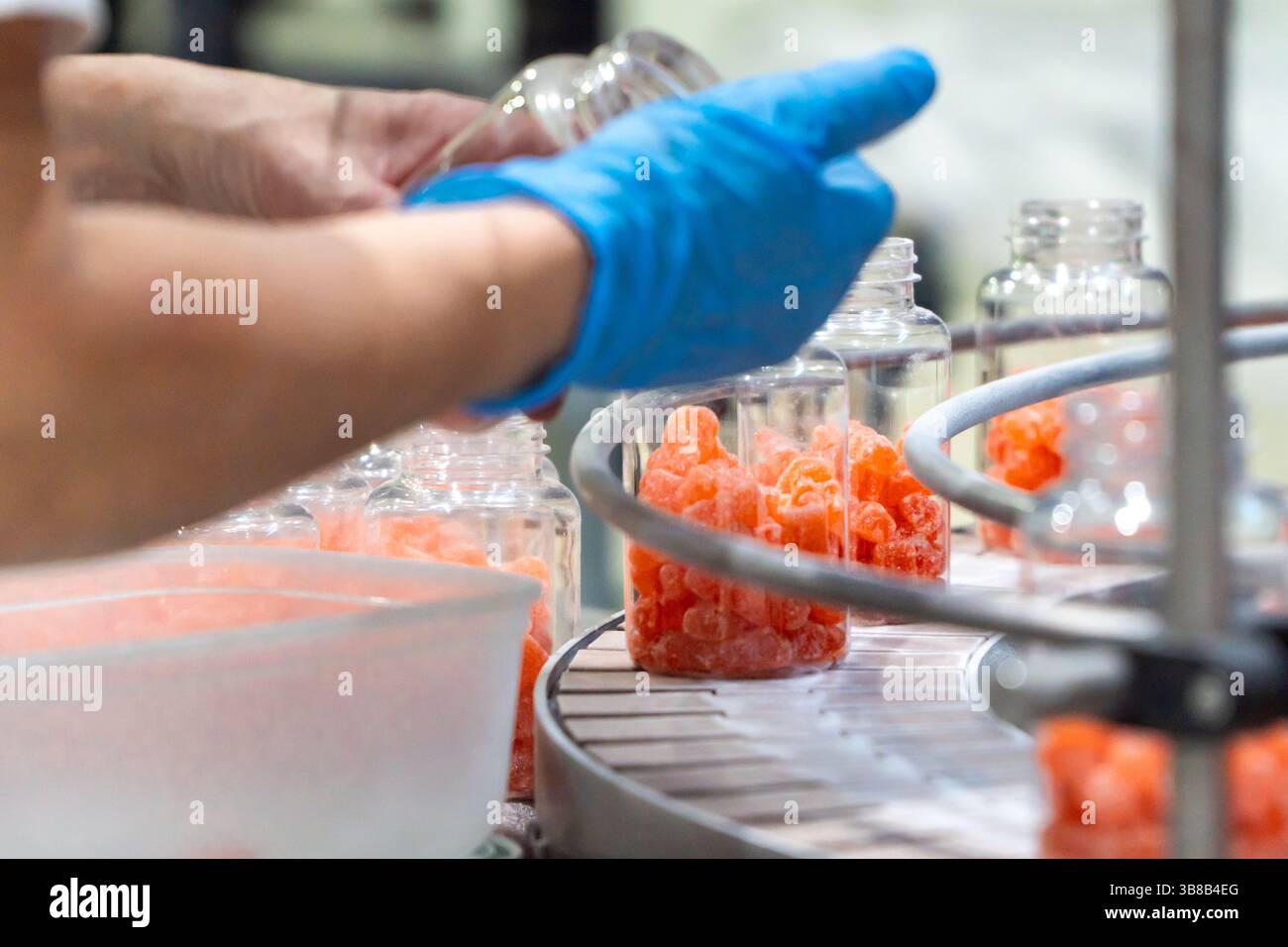 Pharmaceutical employee on an industrial quality control ckecking the ...