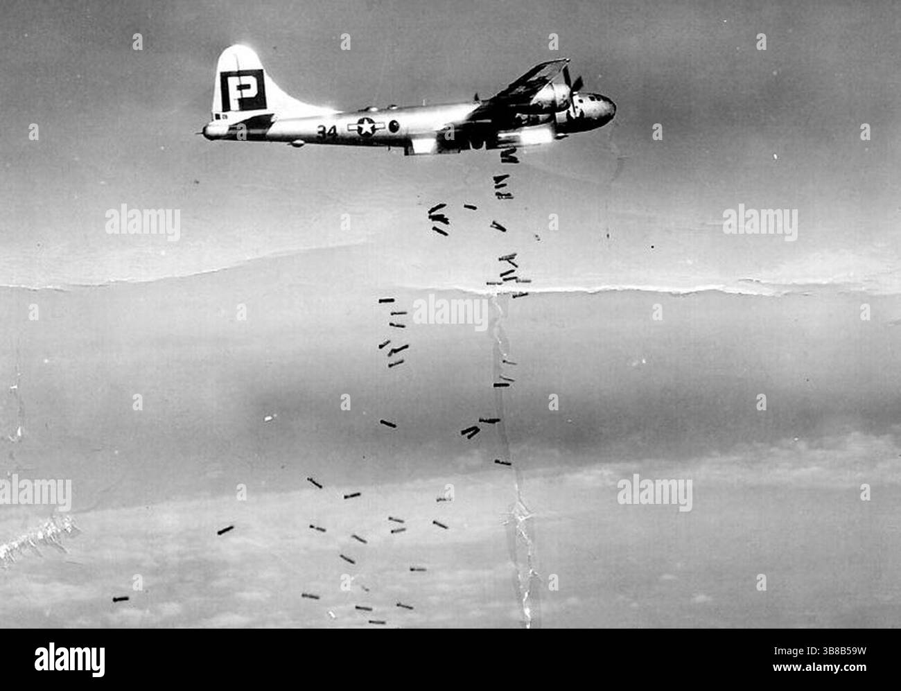 9th Bombardment Group B-29 Superfortress dropping 500 pound high ...