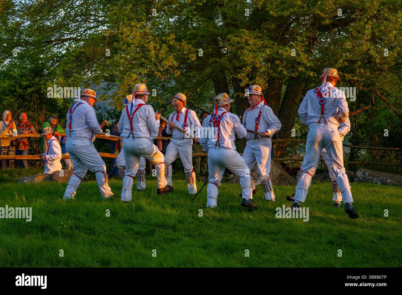 Morris dancers dancing on Coldrum Long barrow near Trottiscliffe at ...
