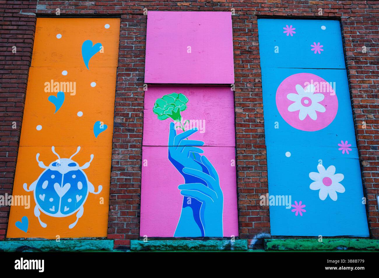 A mural on an old brick building in Mount Pleasant, Vancouver, BC Stock ...