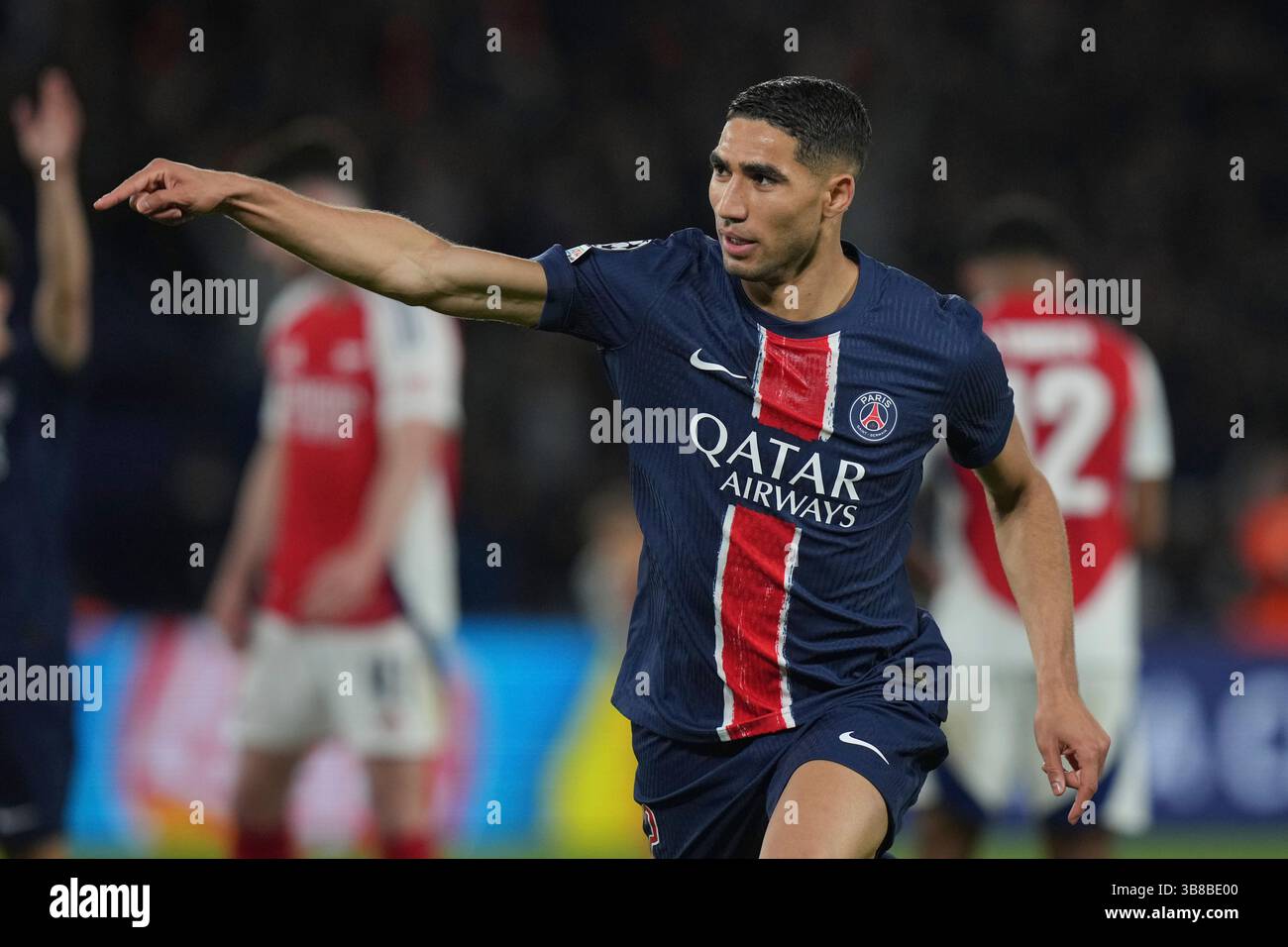 PSG's Achraf Hakimi runs to celebrate after scoring his side's second ...