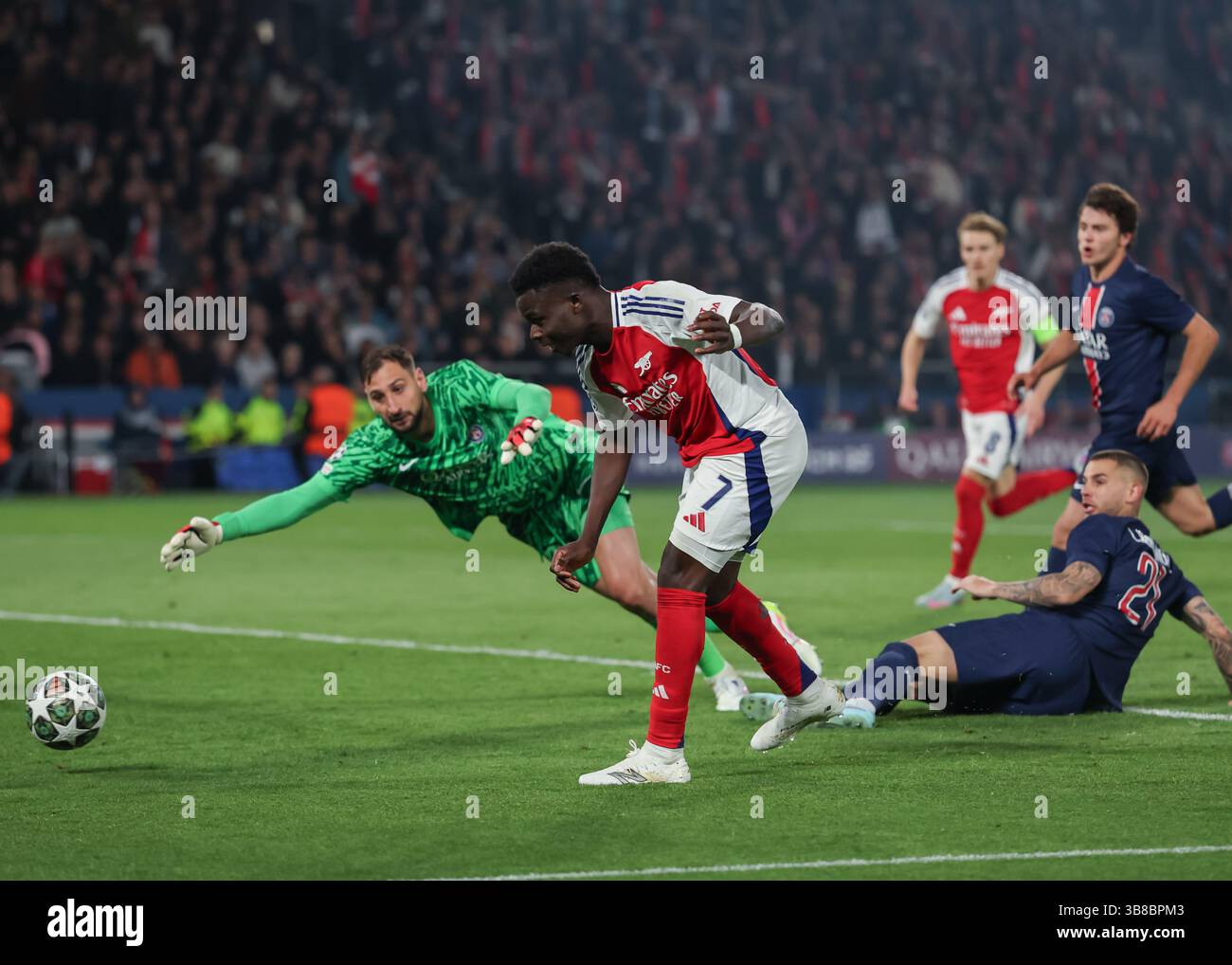 Paris, France. 7th May, 2025. Bukayo Saka of Arsenal scores his sides ...
