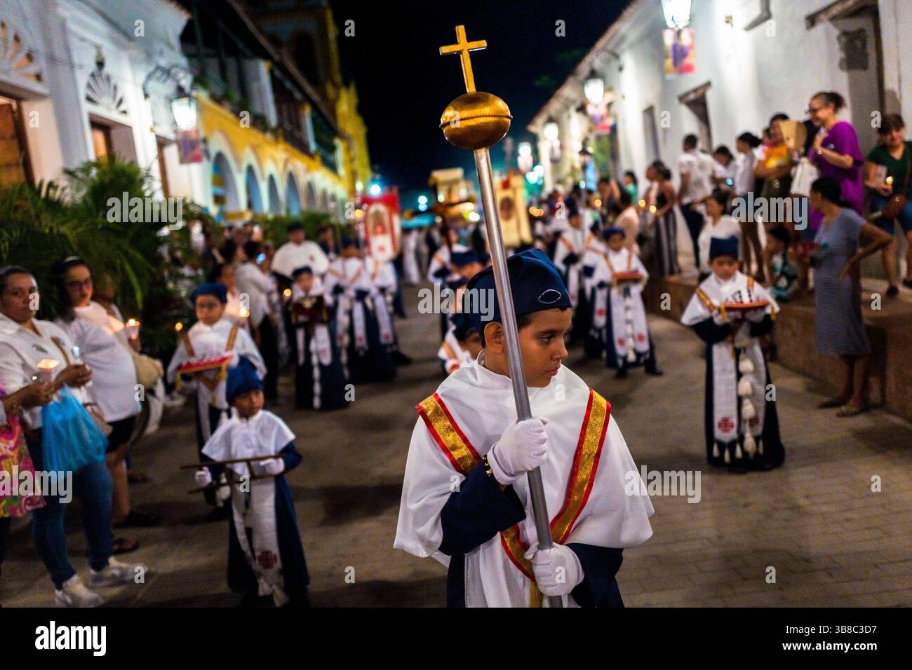 Nazarenitos, the child Nazarenes, walk at the front of a religious ...