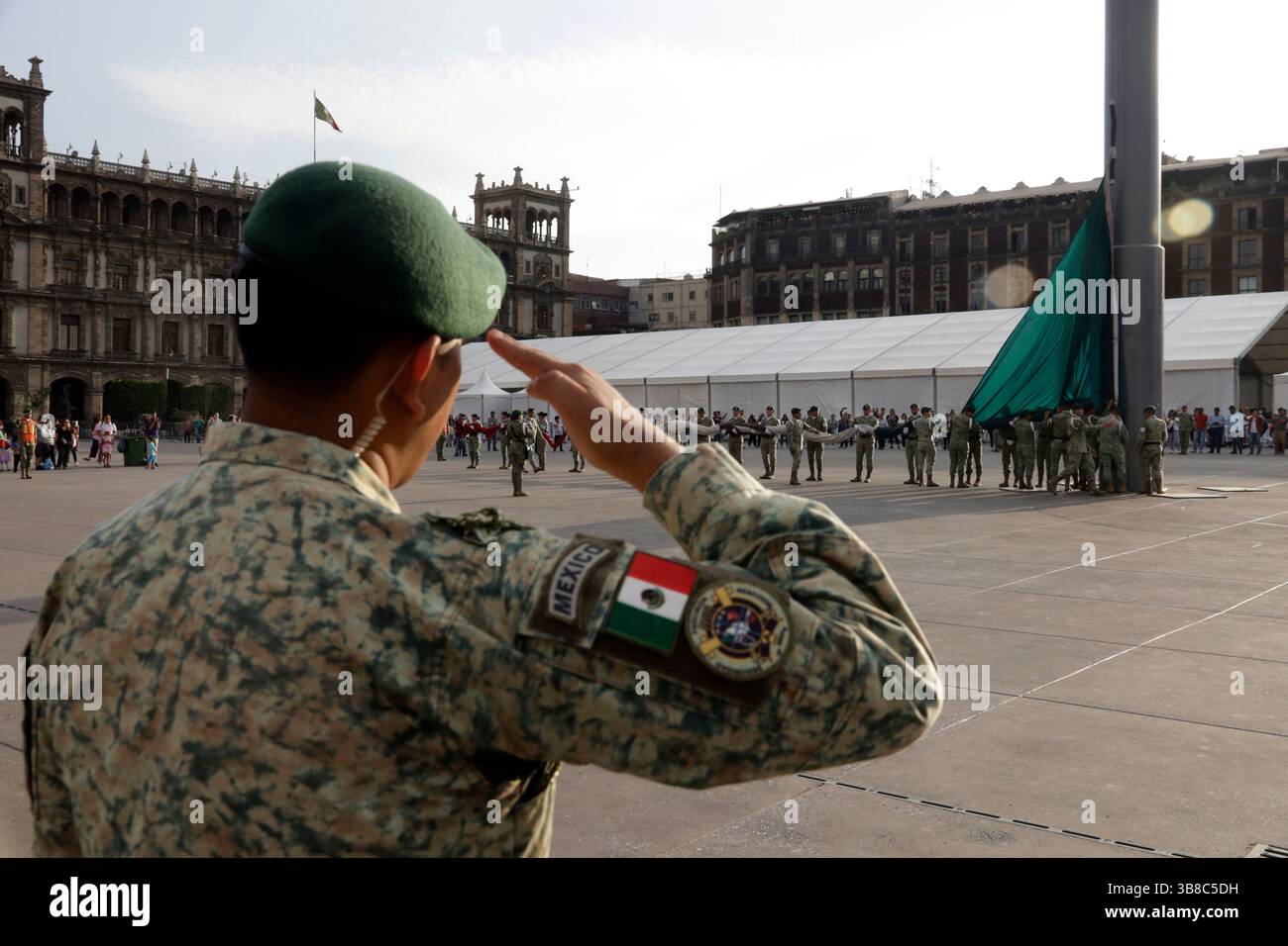 A military of the Mexican Army during the lowering ceremony of the ...