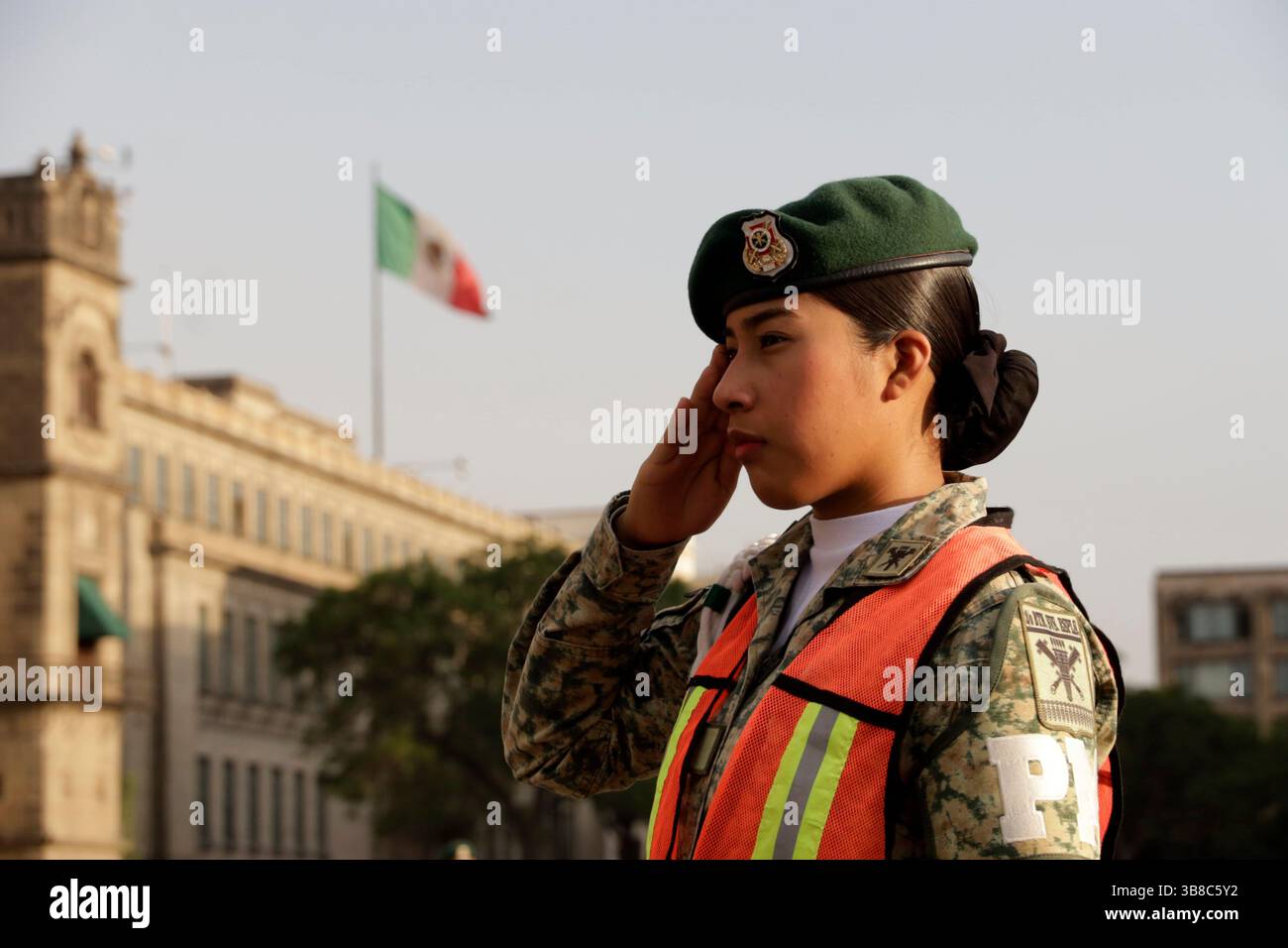 A military woman of the Mexican Army during the lowering ceremony of ...