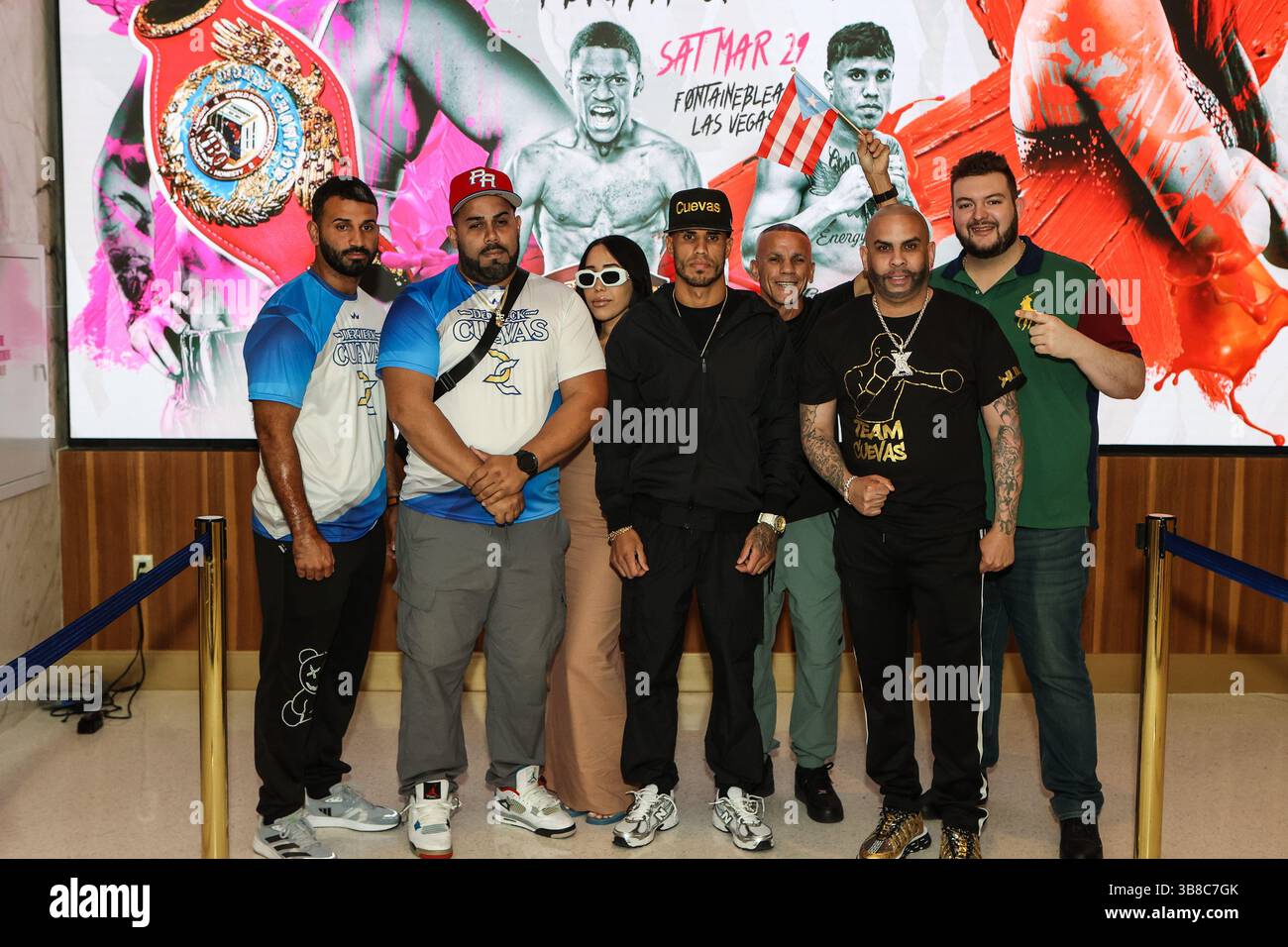 March 26, 2025: Derrieck Cuevas and members of his pose for a photo ...
