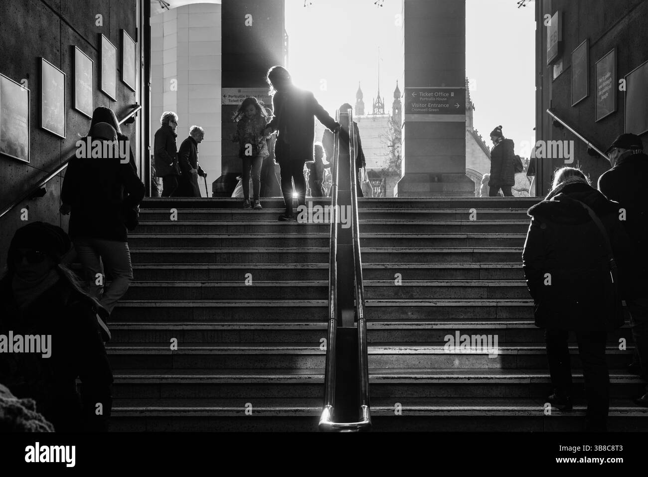 Winter sunlight streams into Westminster Underground tube station exit ...