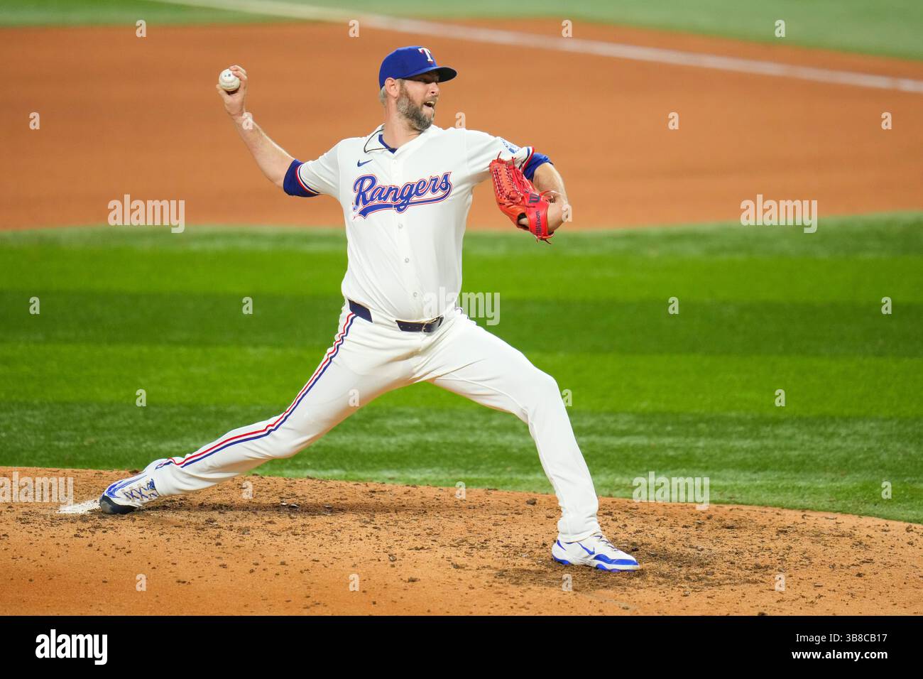 Texas Rangers pitcher Chris Martin throws a pitch to the Athletics ...